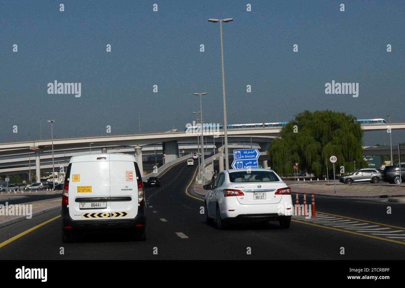 Driving on the E11 Sheikh Zayed Rd highway in the Media city and ...