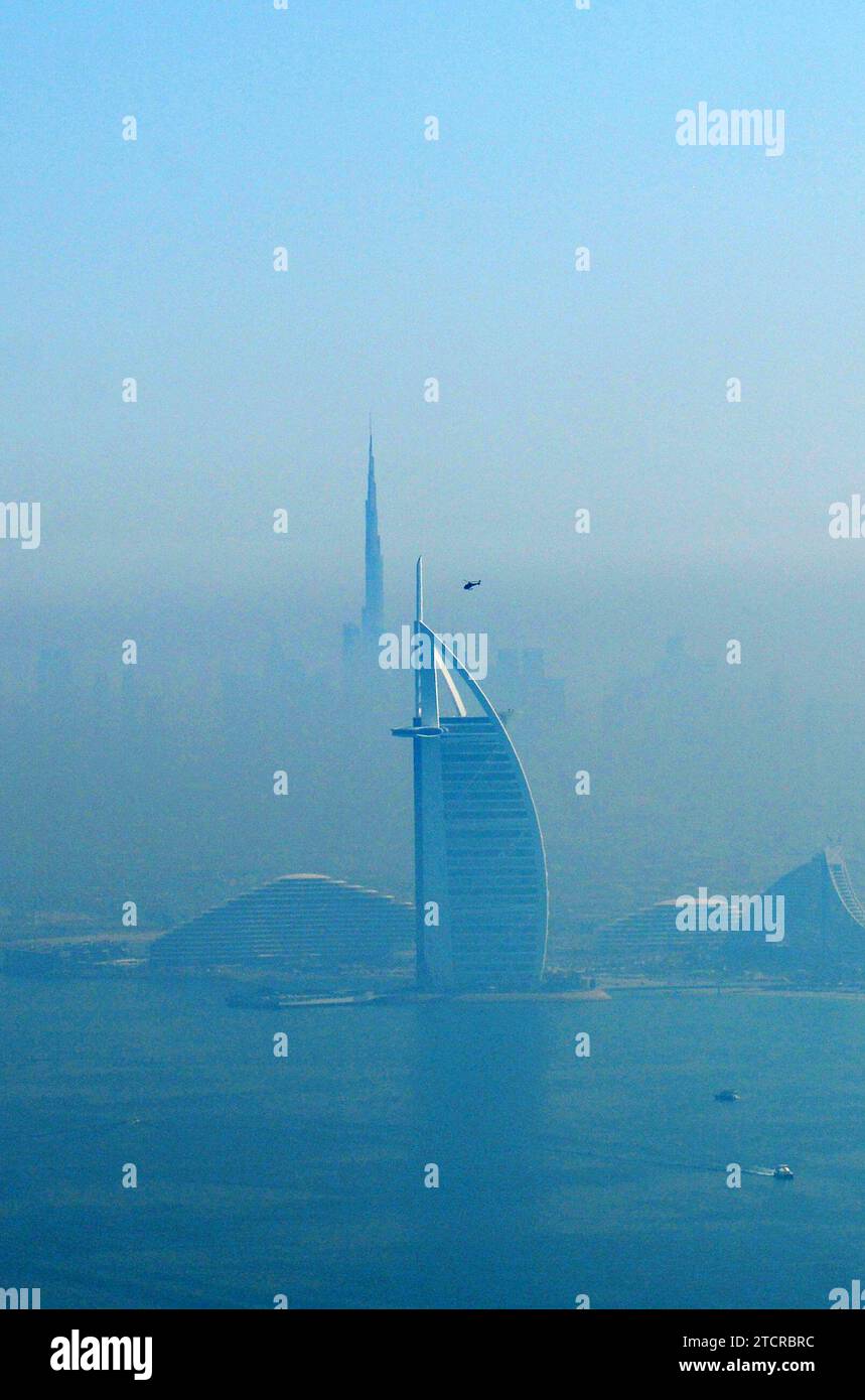 A view of Burj Al Arab and the Burj Khalifa skyscraper behind it. Dubai ...