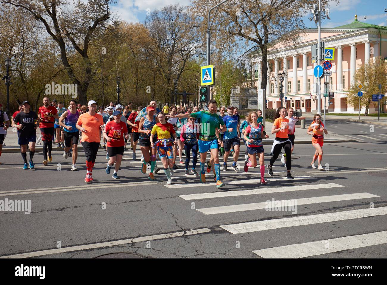 People run together in an organized mass running event for running ...
