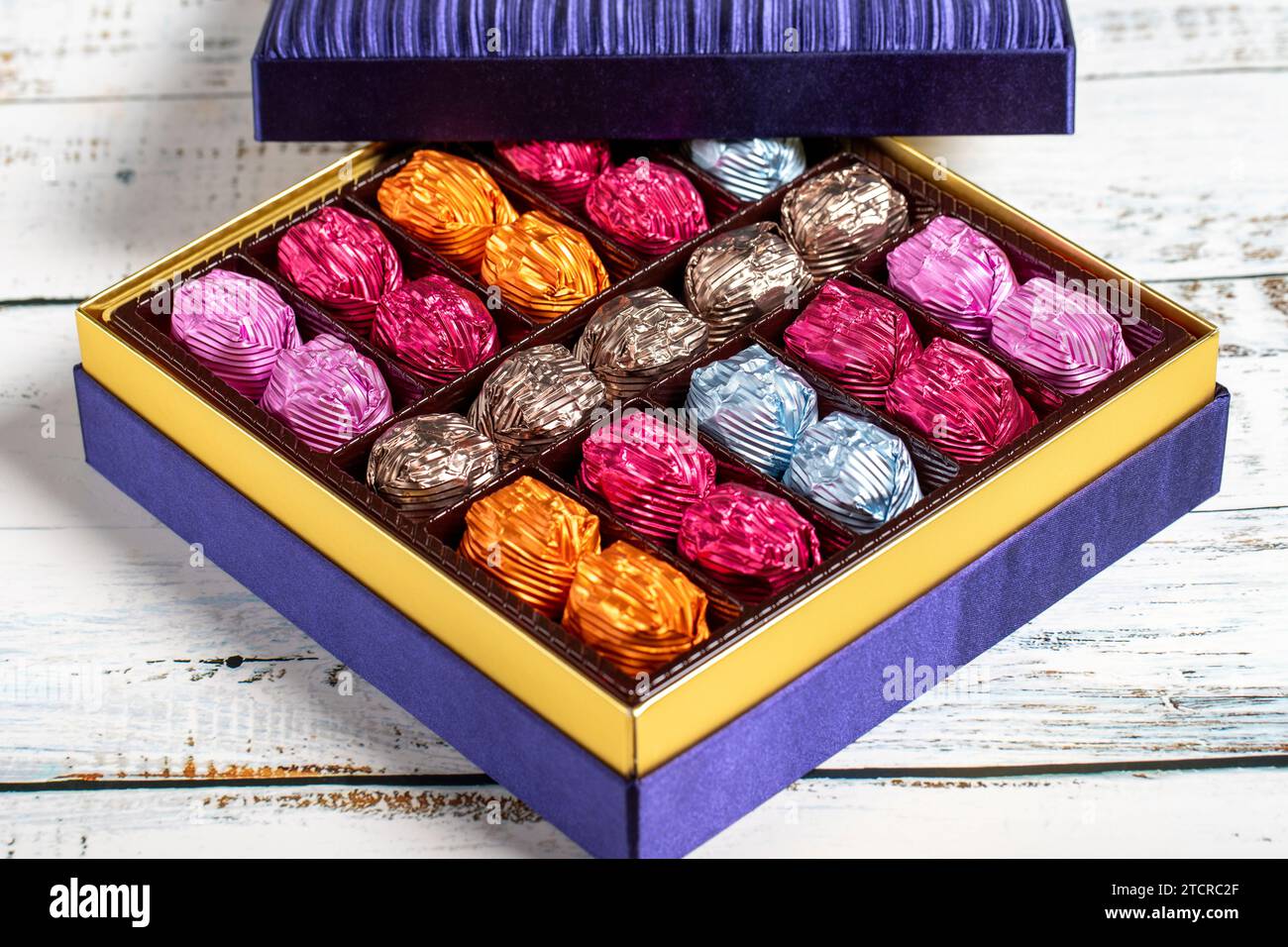 Packaged chocolate. Luxury chocolate on white background. Close up ...