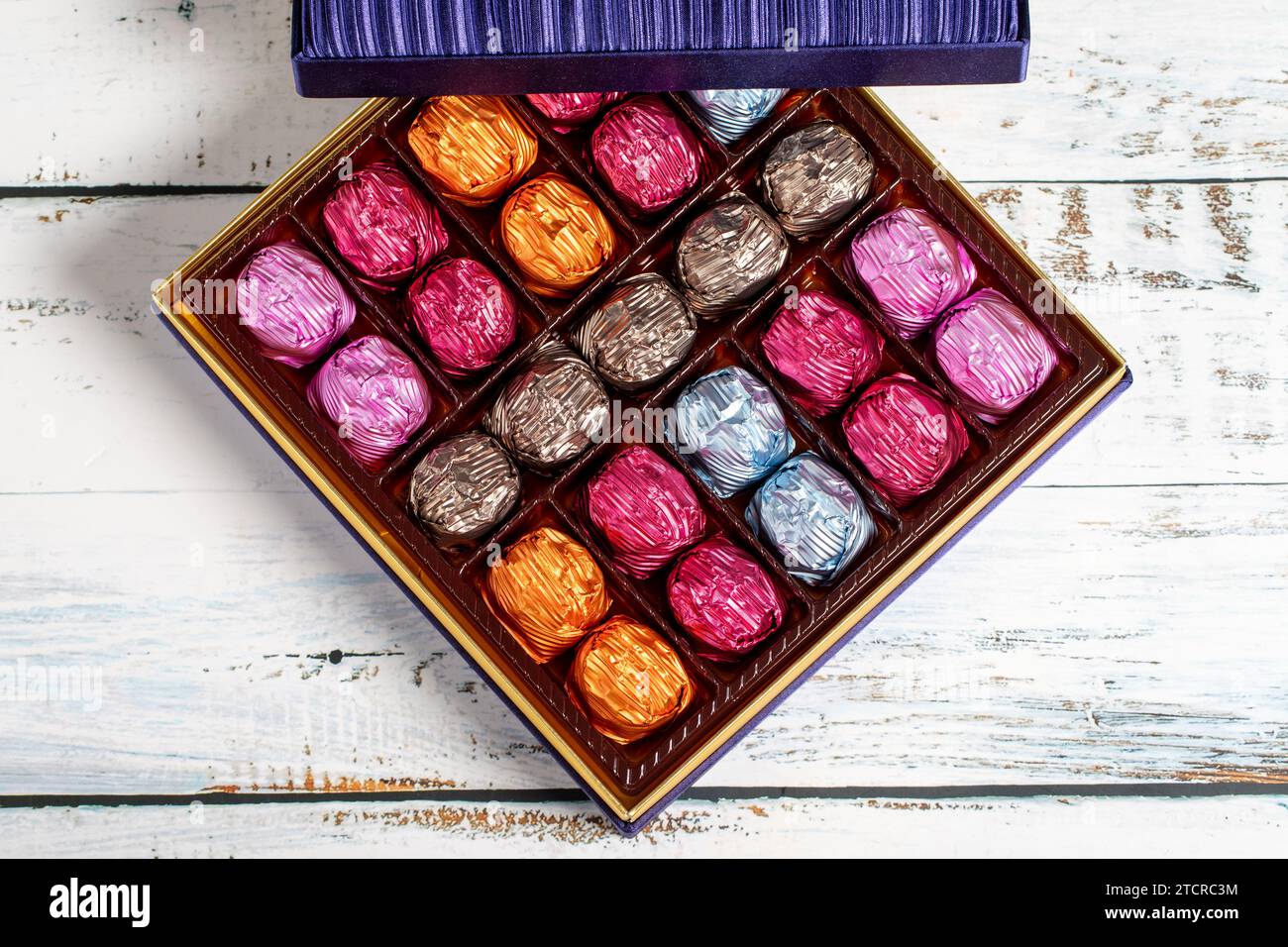 Packaged chocolate. Luxury chocolate on white background. Top view ...