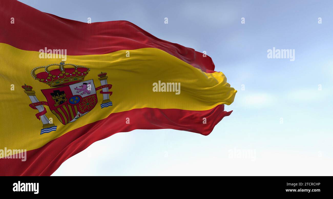 Close-up of Spain national flag waving in the wind. Red, yellow, red ...