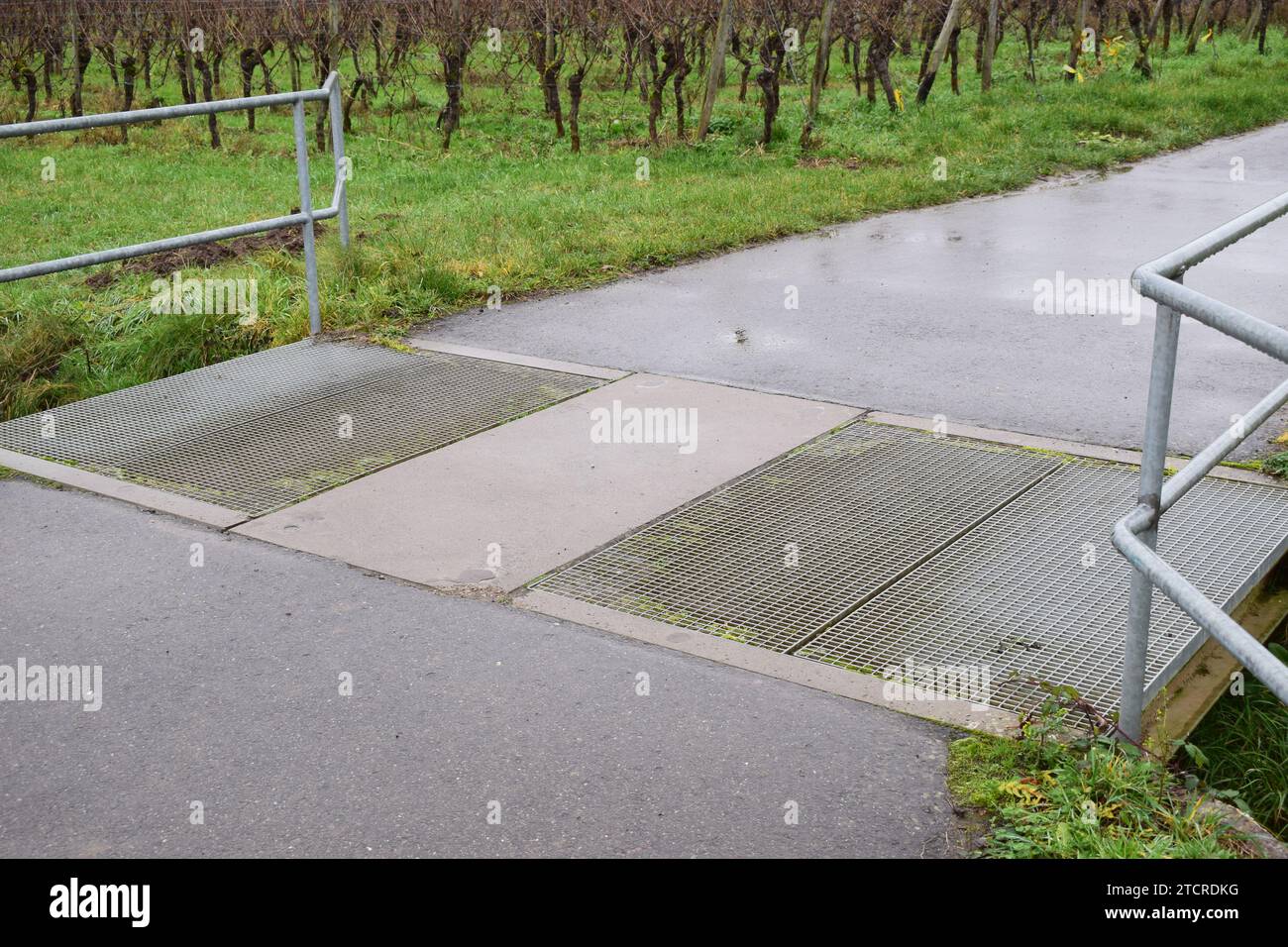 tiny bridge across a tiny river Stock Photo - Alamy
