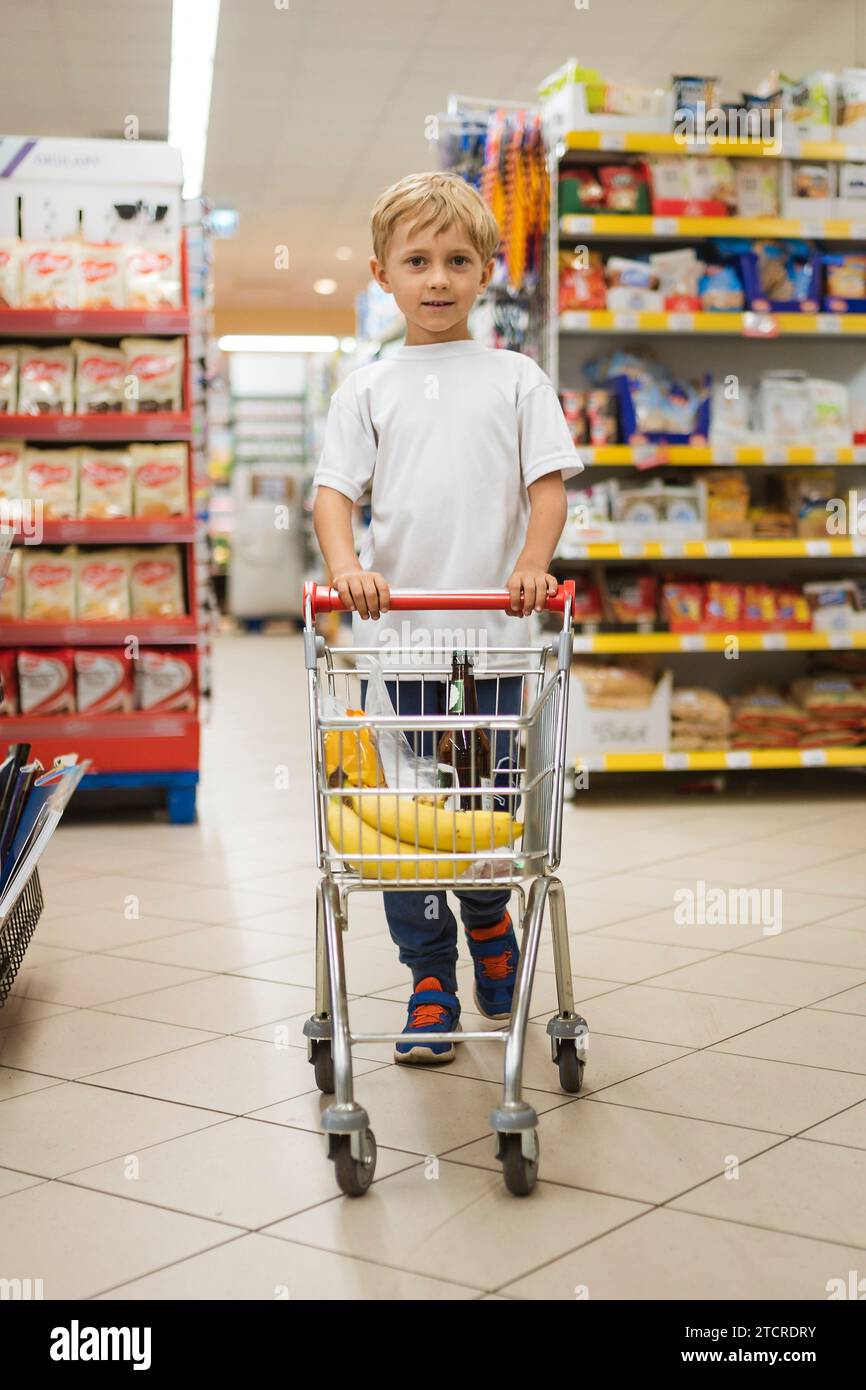 Child supermarket trolley hi-res stock photography and images - Alamy