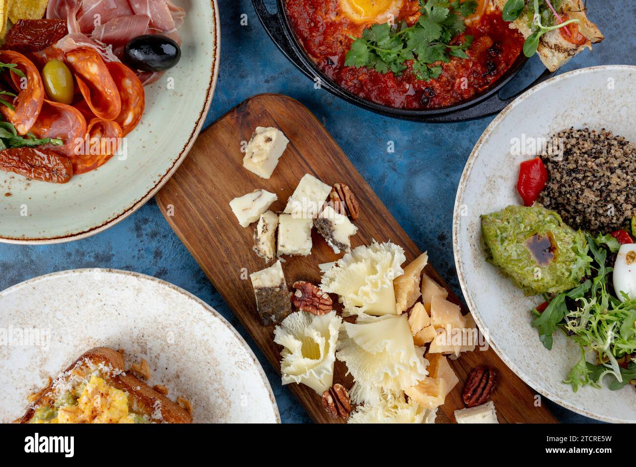 Italian cuisine. table served with plates of Italian dishes Stock Photo ...