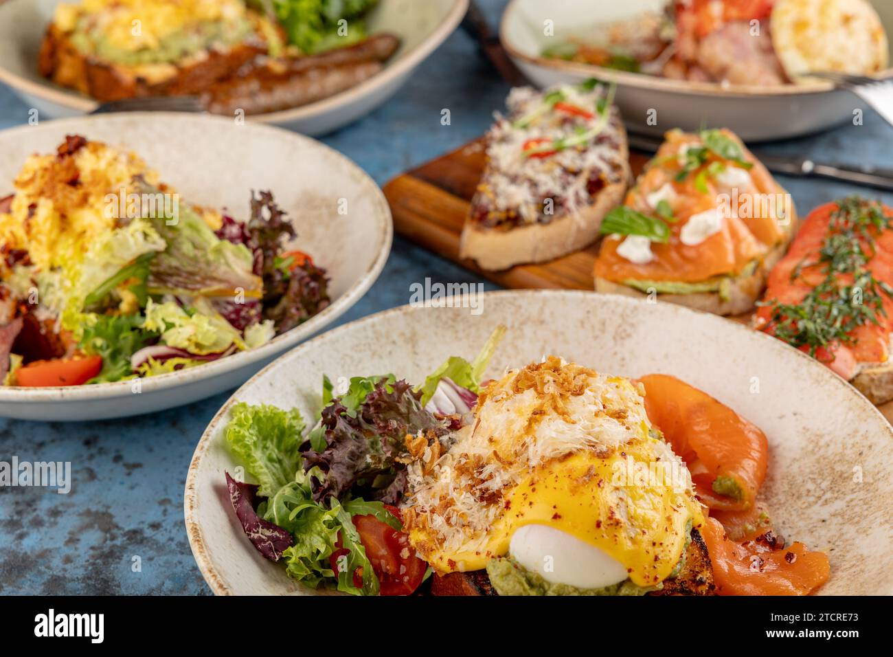 Italian cuisine. table served with plates of Italian dishes Stock Photo ...