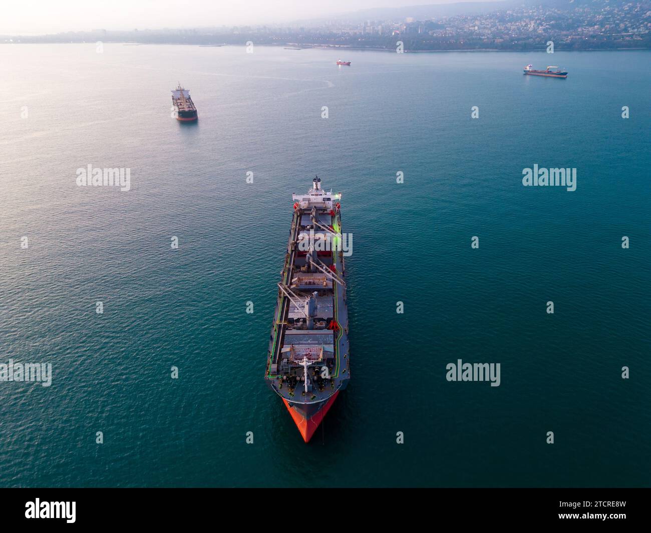 A massive cargo ship wood chips carrier in the sea, aerial view Stock ...