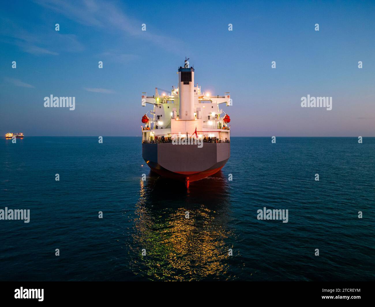 A massive cargo ship wood chips carrier in the sea, aerial view Stock ...
