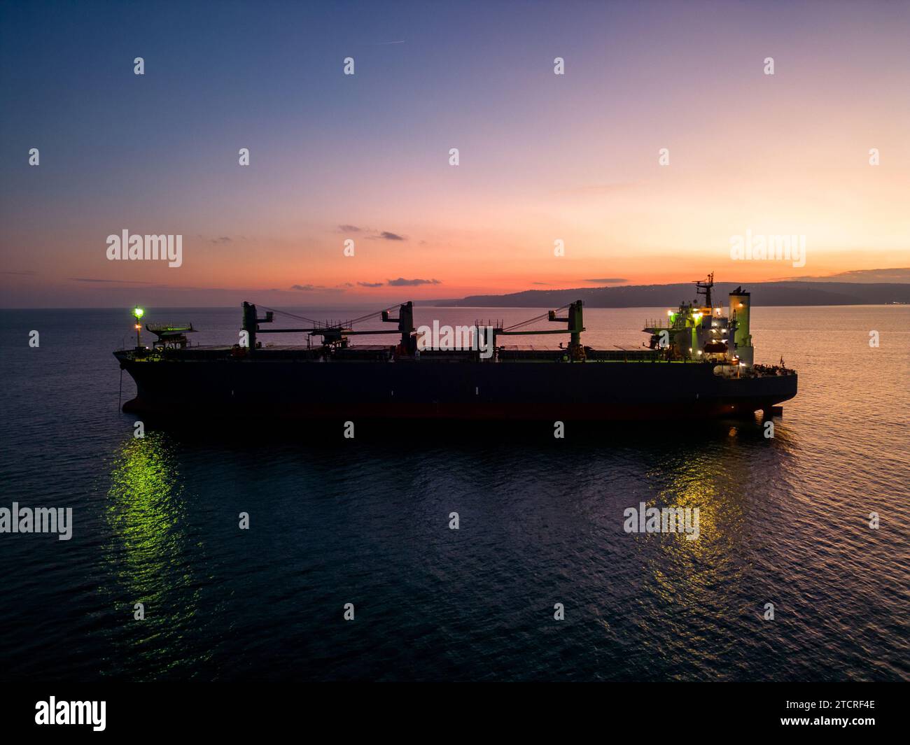 A massive cargo ship wood chips carrier in the sea, aerial view Stock ...