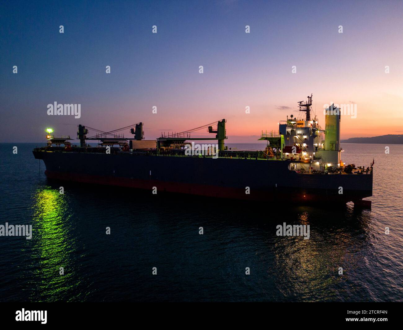 A massive cargo ship wood chips carrier in the sea, aerial view Stock ...