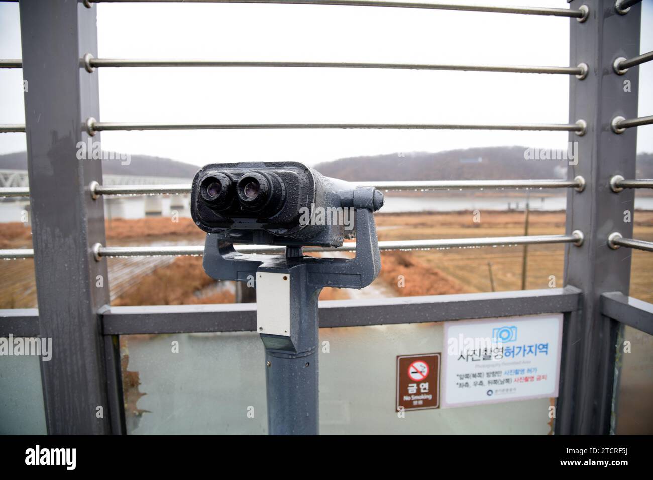 Paju, South Korea. 14th Dec, 2023. A viewing scope allows tourists to ...