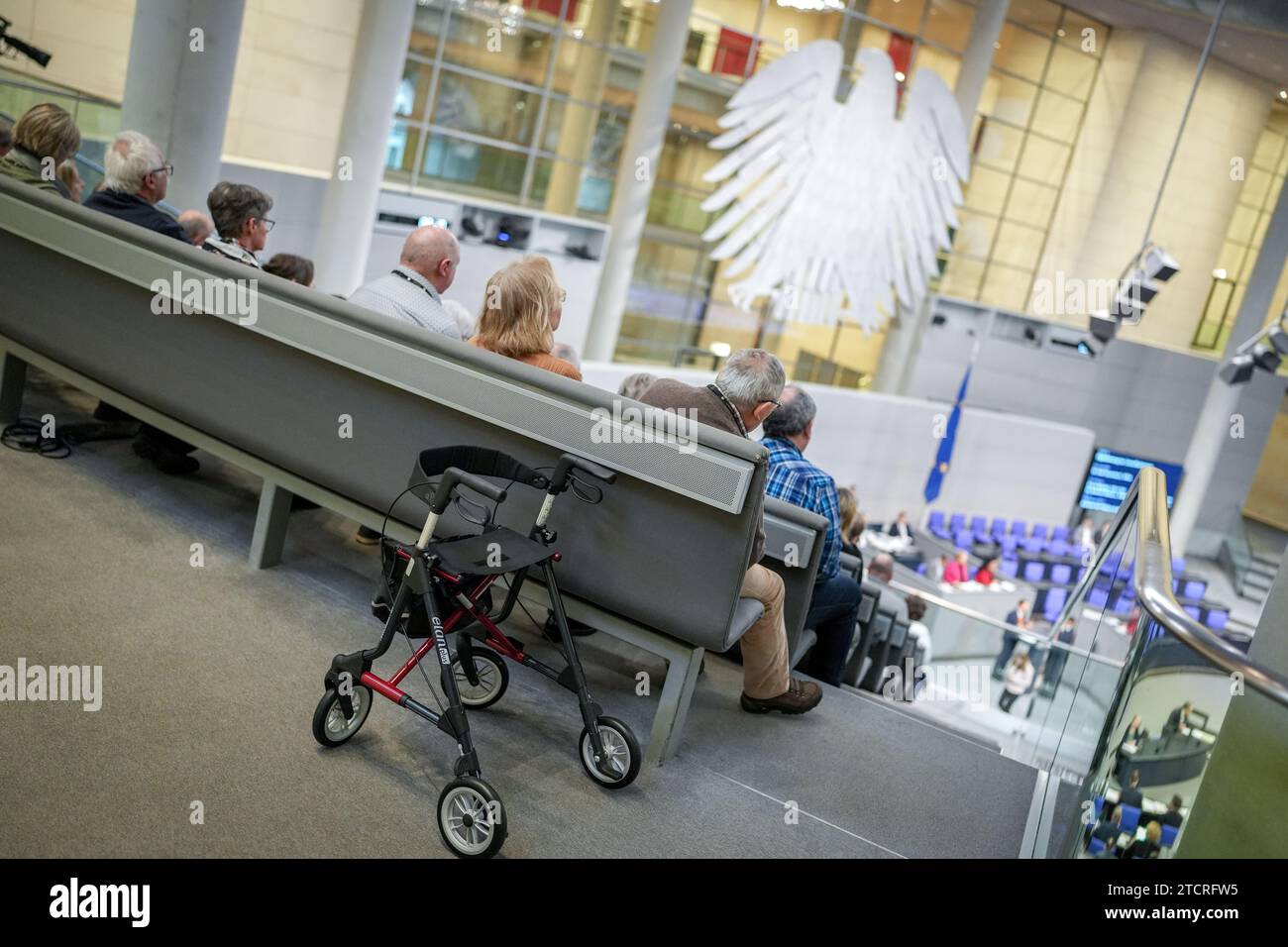 Berlin, Germany. 14th Dec, 2023. A rollator stands behind the visitors ...