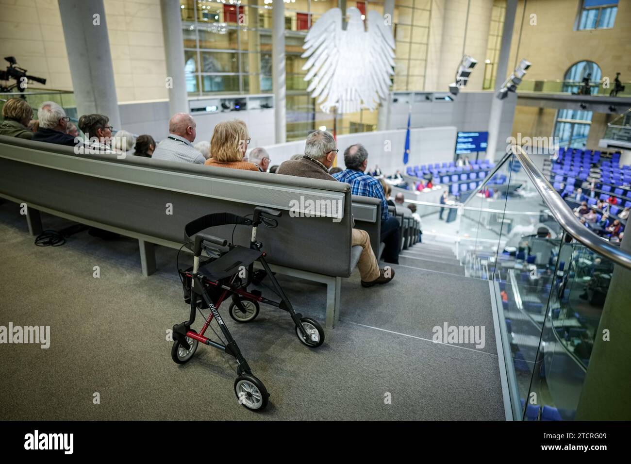 Berlin, Germany. 14th Dec, 2023. A rollator stands behind the visitors ...