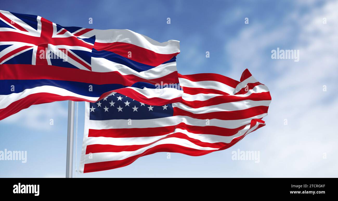 Hawaii state flag waving with the national flag of the United States of ...