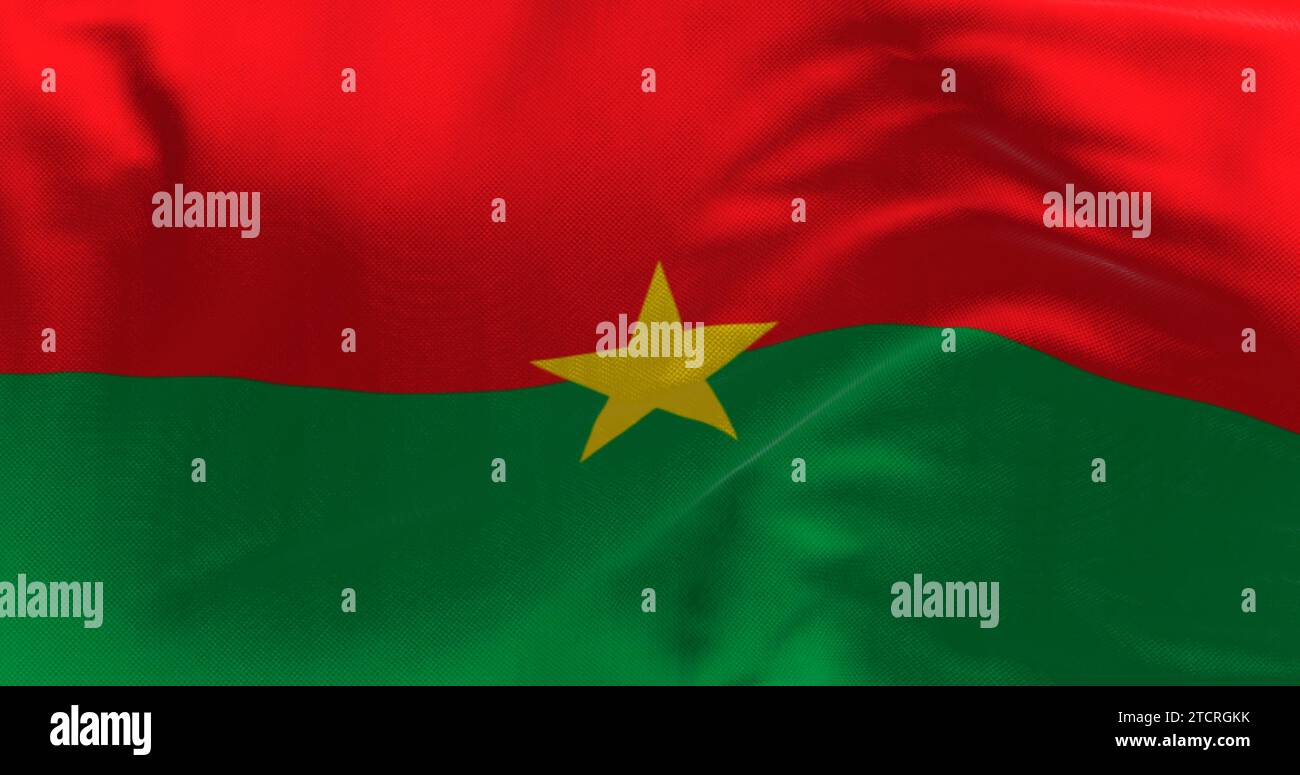 Close-up of national flag of Burkina Faso waving. Two equal horizontal ...