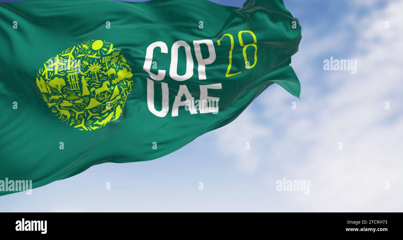 Dubai, UAE, Nov. 30 2023: Close-up of COP28 flag waving on a clear day ...