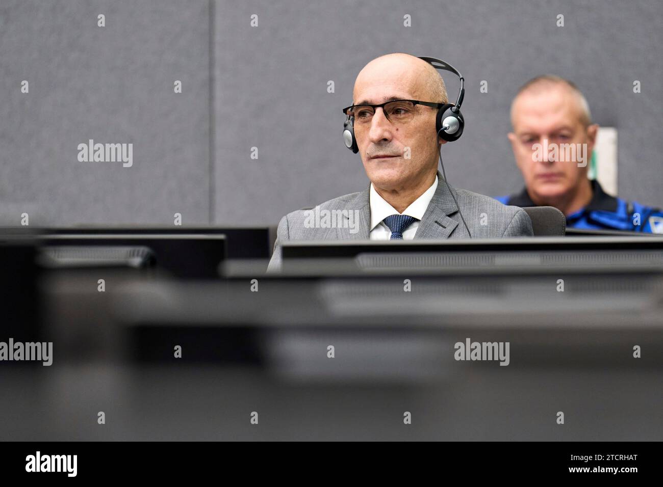 Salih Mustafa sits at a special Kosovo court in The Hague, Netherlands ...