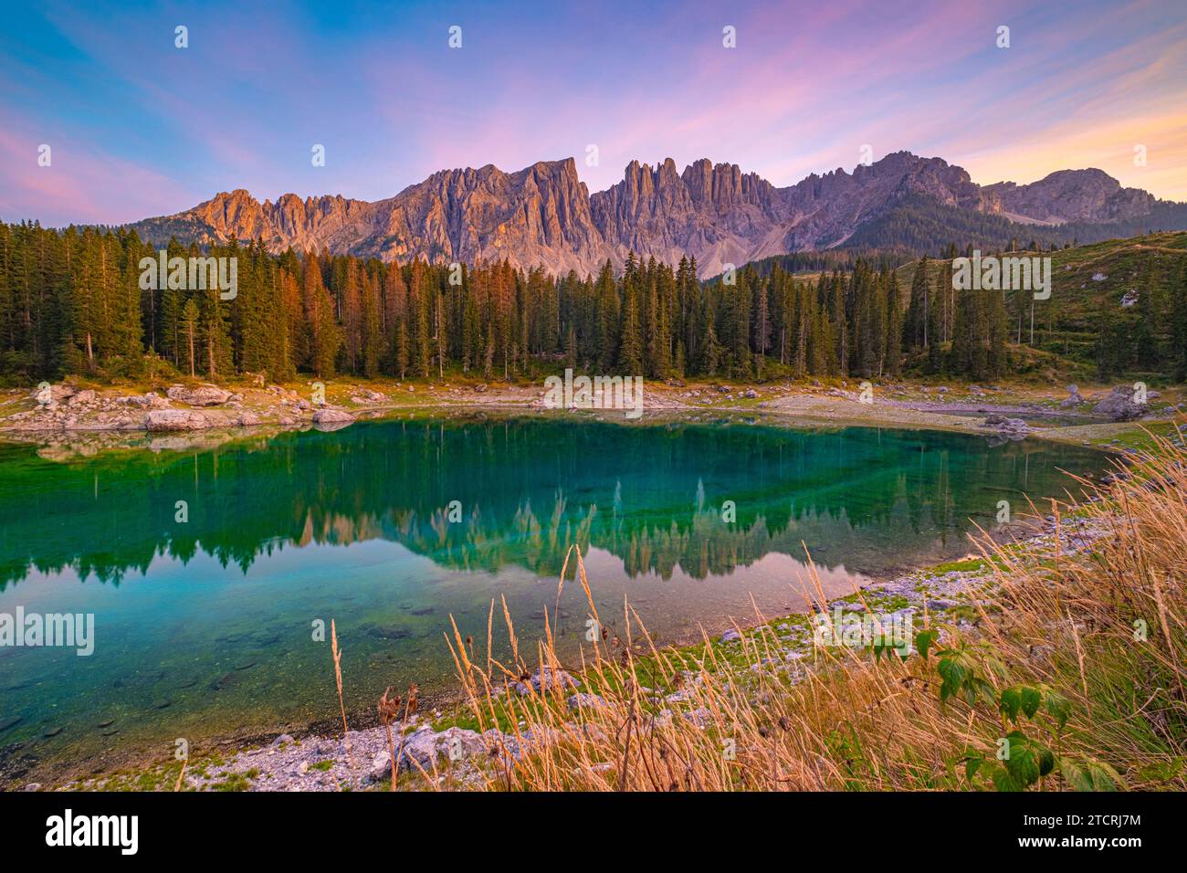 Lago di Carezza,Emerald waters, misty forests, Latemar views, an ...