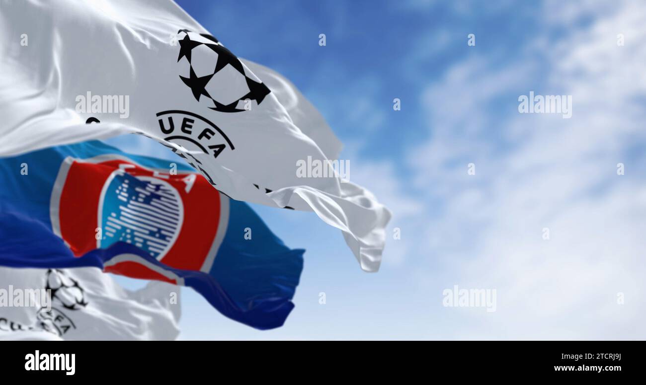 London, UK, Dec 1 2023: UEFA and UEFA Champions league flags waving ...