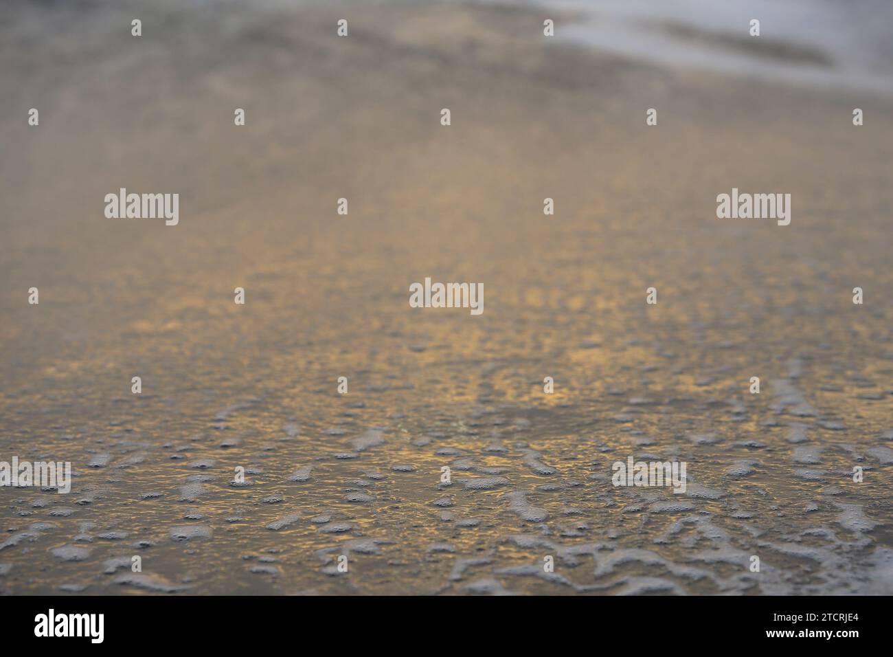 Abstract beach scene with sea water foam patterns on the shore Stock ...