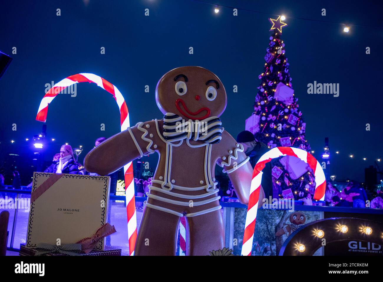 London, UK. 13th Dec, 2023. Gingerbread man installation stands with ...