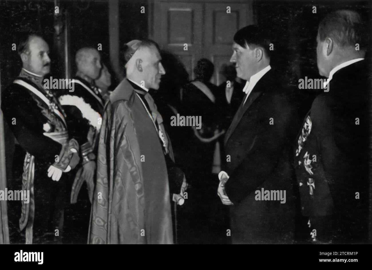 At the 1935 New Year's reception, Adolf Hitler is shown in a meeting ...