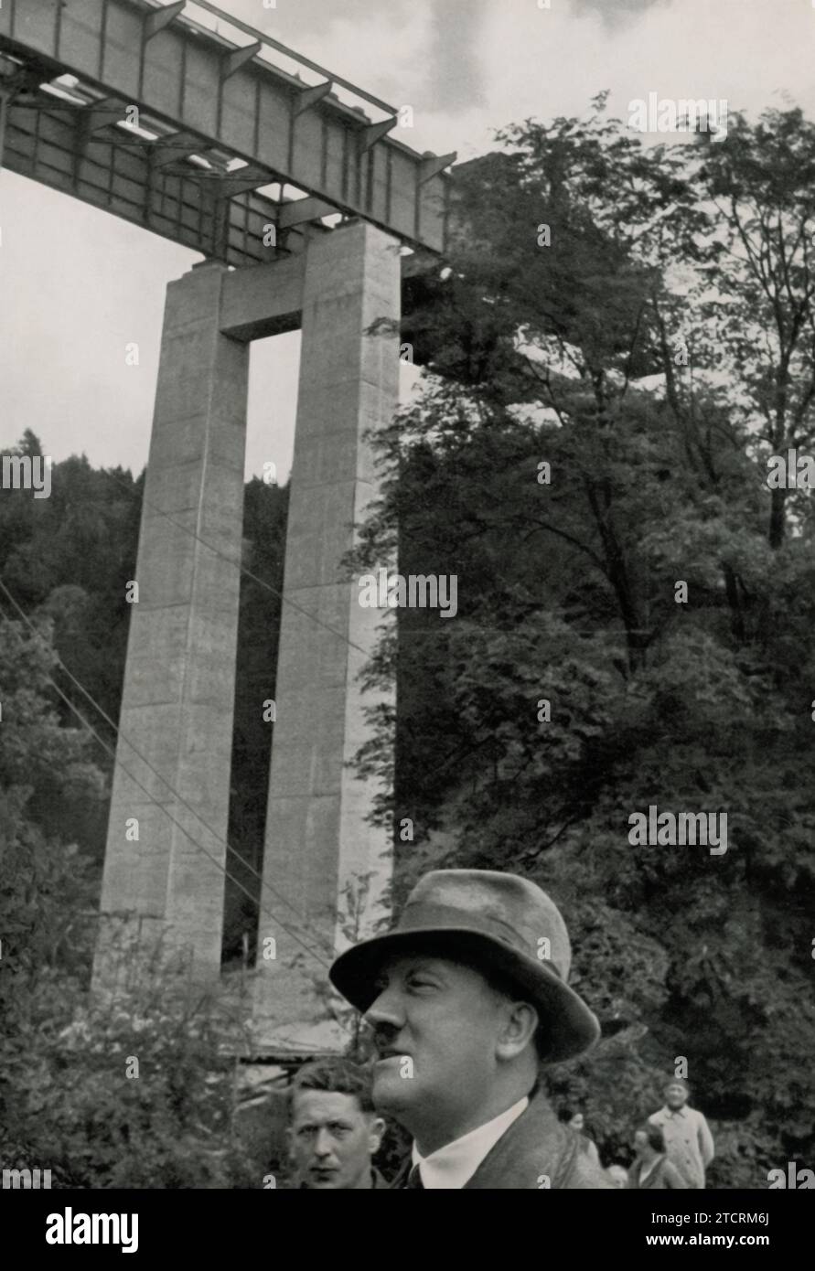 In the summer of 1935, Adolf Hitler visits the Mangfall Bridge ...