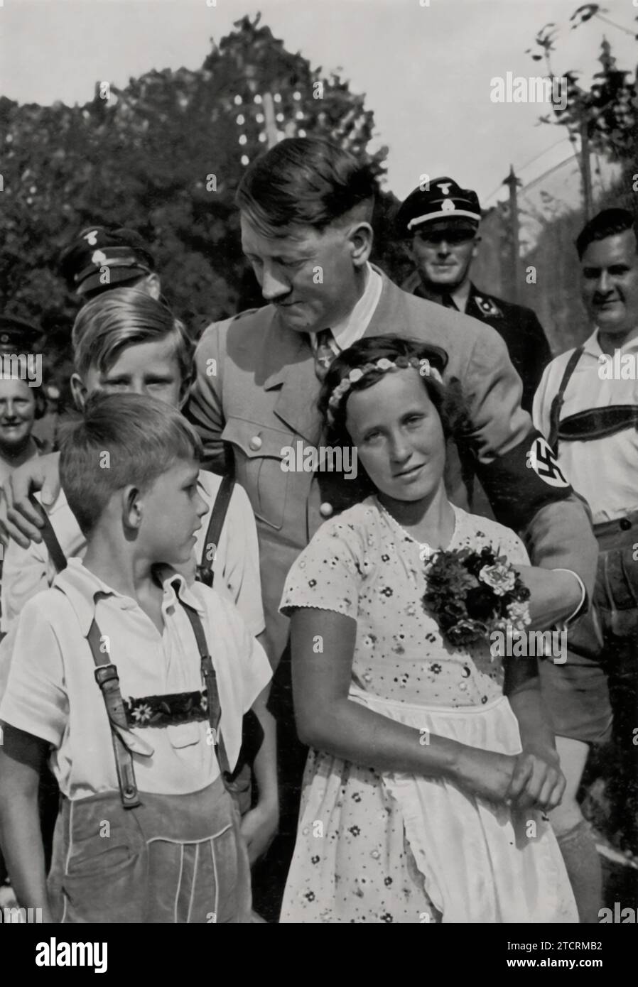 Adolf Hitler is frequently depicted surrounded by children, a recurring ...
