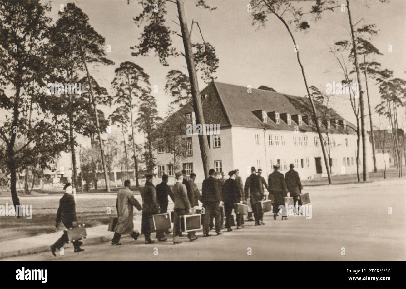 German recruits arriving at a military base, circa 1935, to commence ...