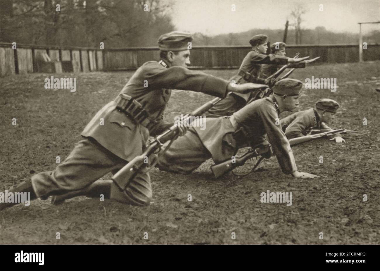 German recruits are captured in the midst of a drill practice, learning ...