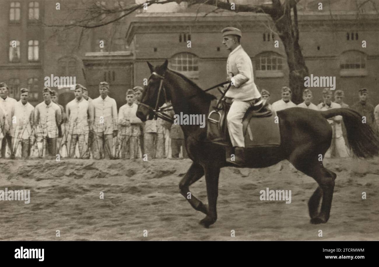 Demonstrating equestrian prowess, German soldiers jump obstacles on ...