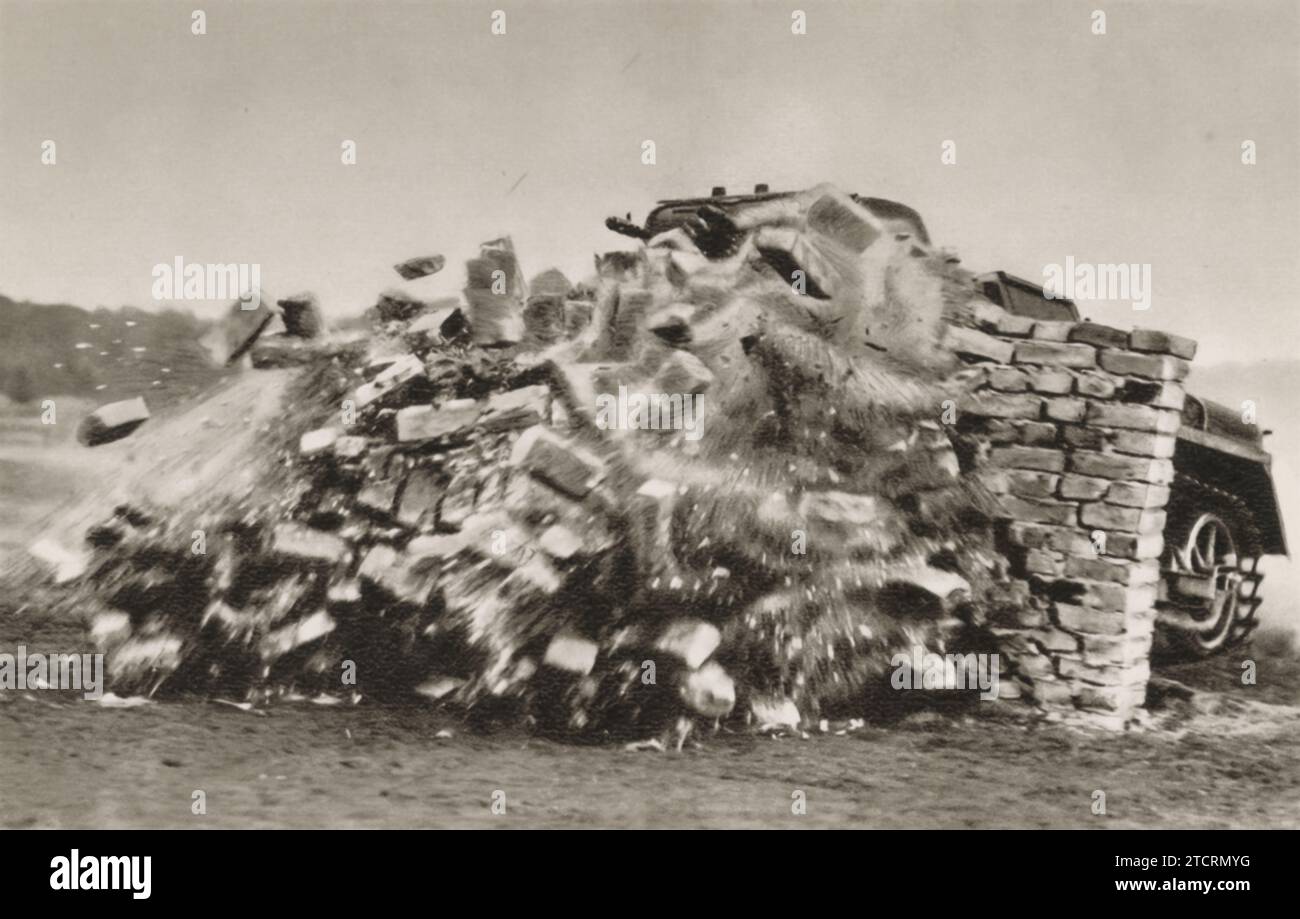 In a striking demonstration of power, a German tank is shown crashing ...
