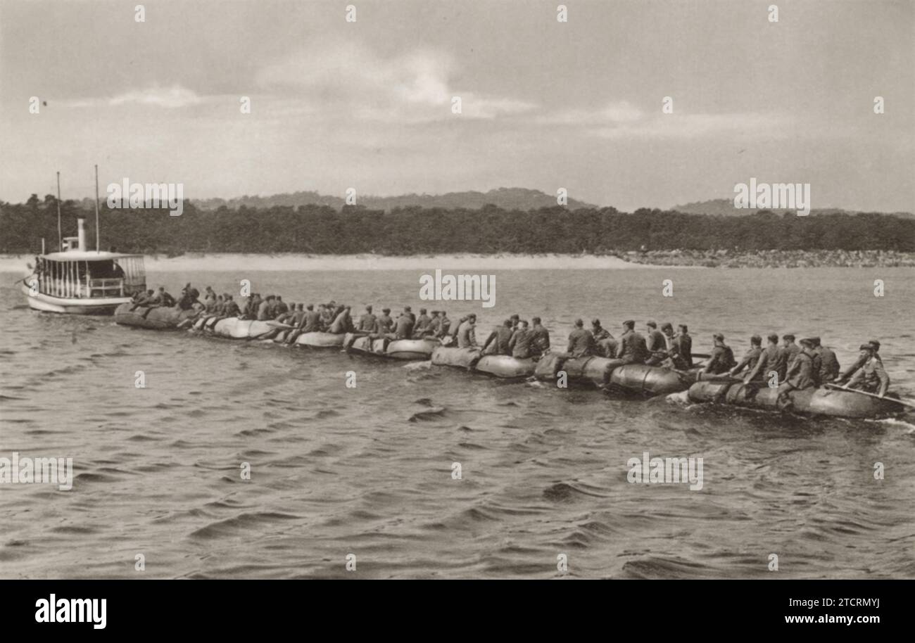 Captured in the middle of open water, German soldiers, who are military ...
