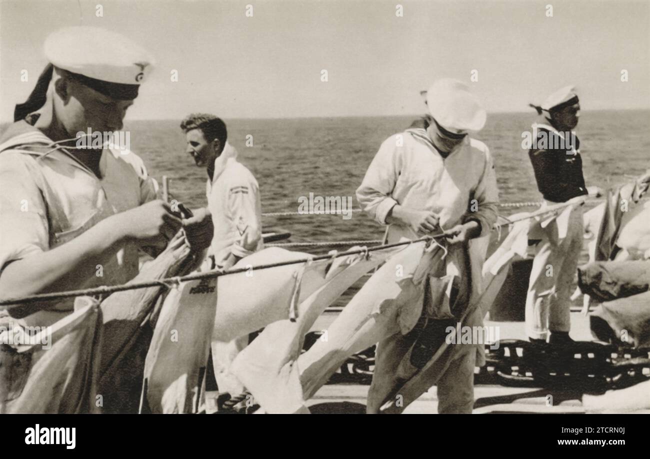 In the photograph, German Marines of the Kriegsmarine are captured in a ...