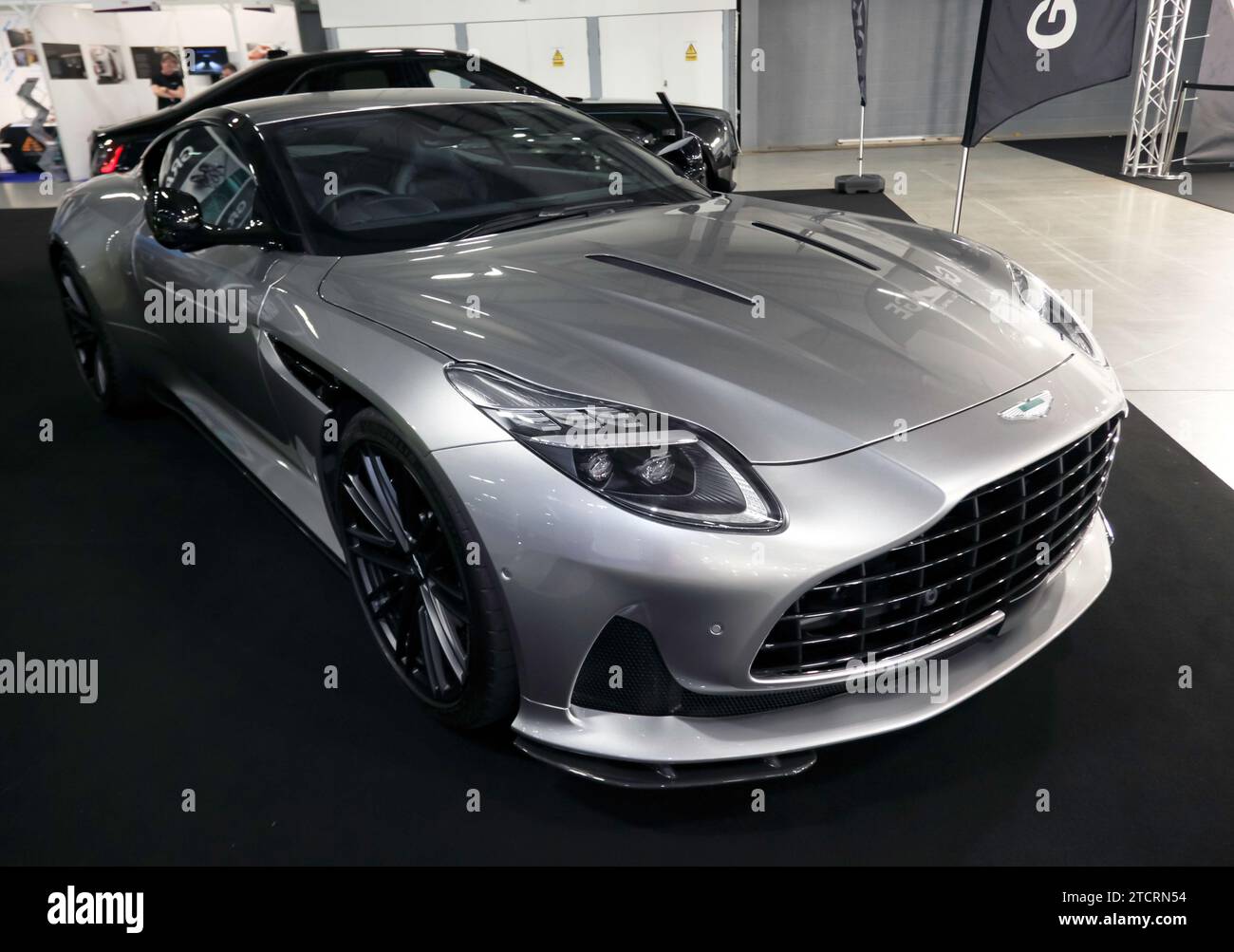 Three-quarters Front View of a 2024, Silver Aston Martin DB12 Coupe, on ...
