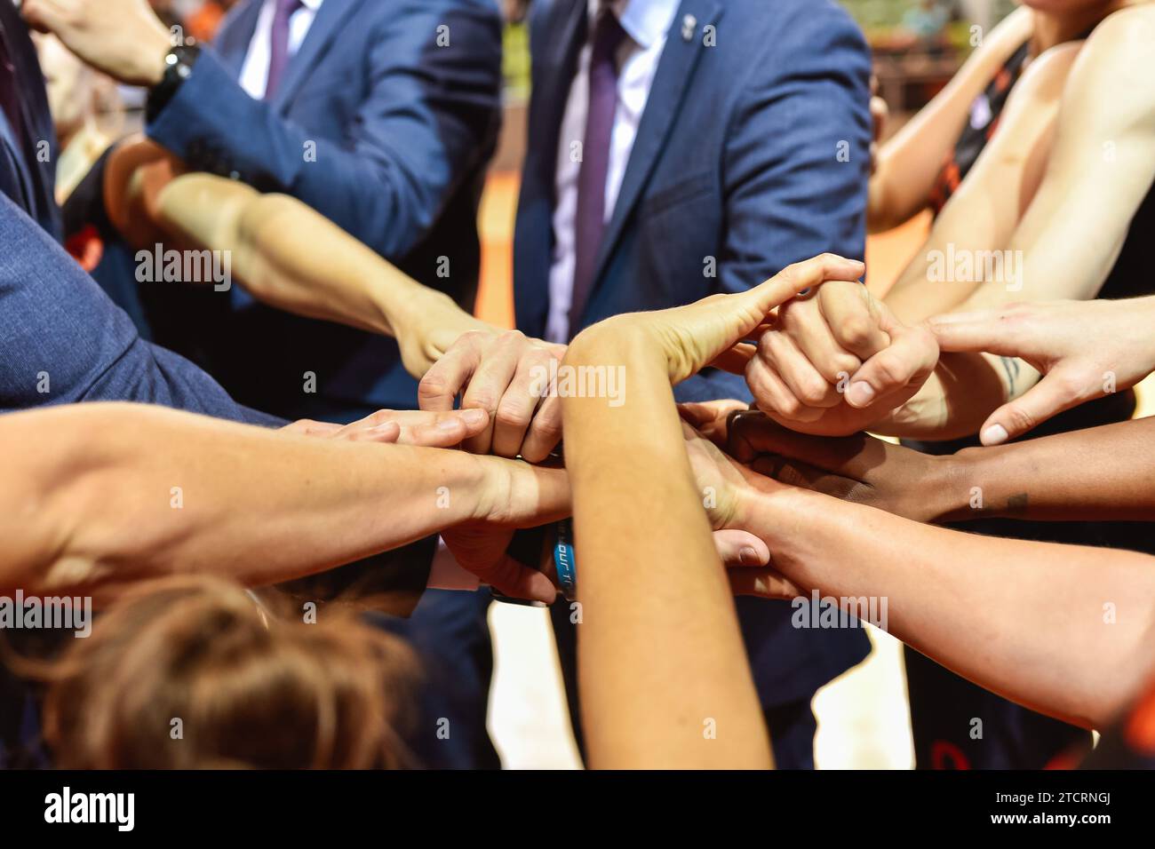 Group many hands team motivation hi-res stock photography and images ...