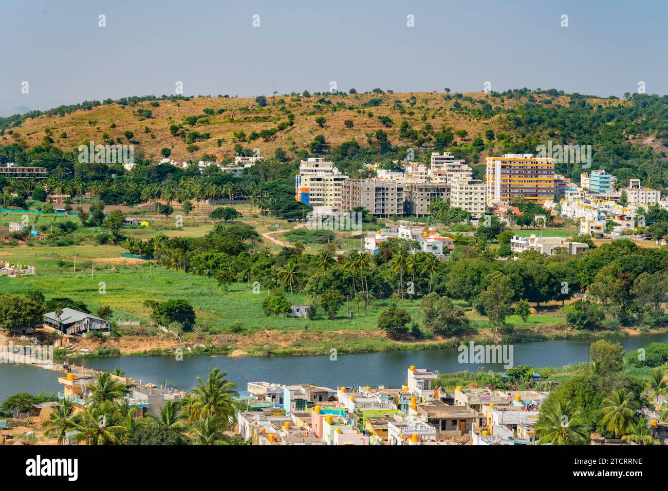 Landscape from a village at Puttaparthi with the houses and river in ...
