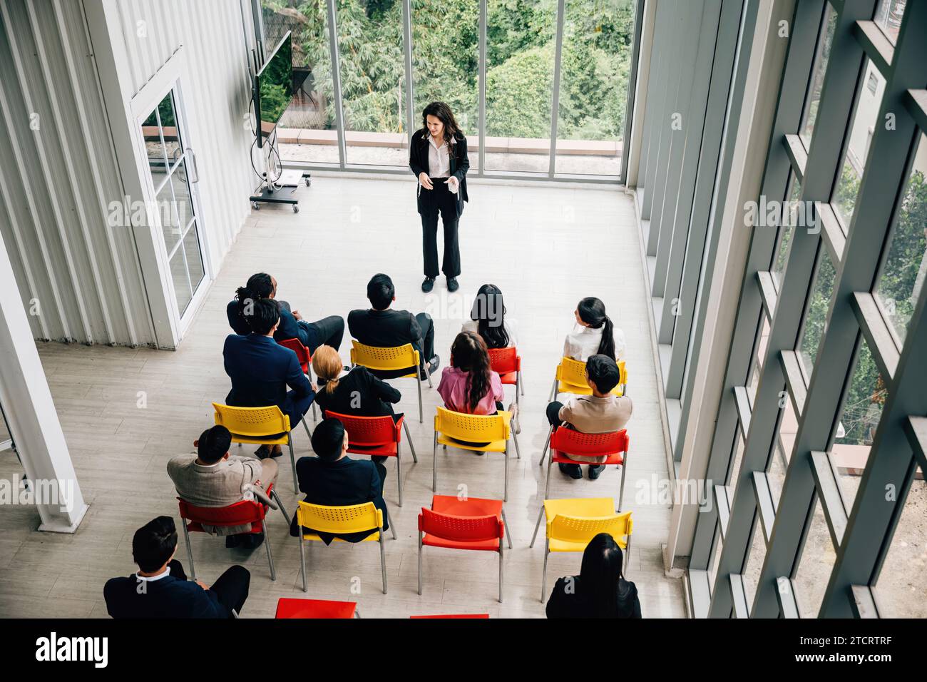 Bird's-eye view of a productive executive meeting. Businesswoman and ...