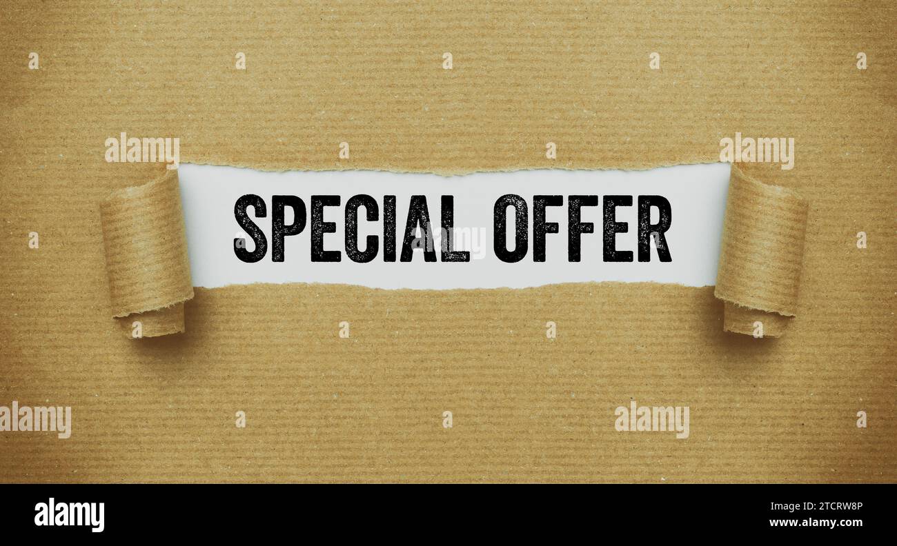 Torn paper revealing the words Special offer Stock Photo - Alamy