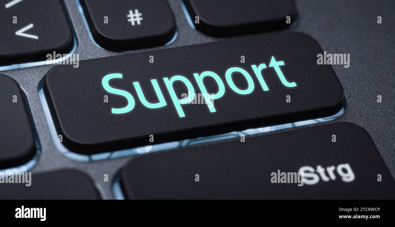 Illuminated keyboard with a labeled key - Support Stock Photo - Alamy