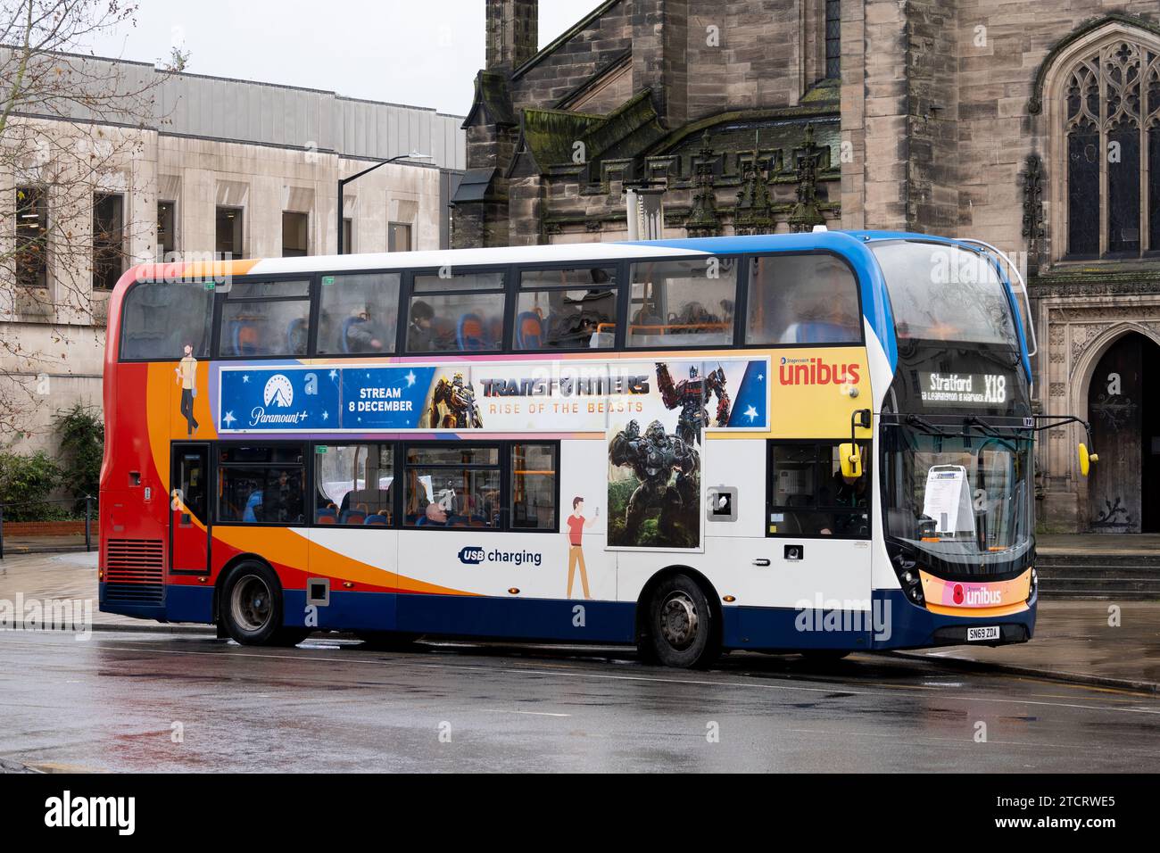 Stagecoach X18 bus service outside Holy Trinity parish church ...