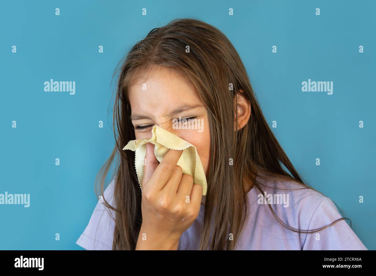 Asian girl blowing nose hi-res stock photography and images - Alamy