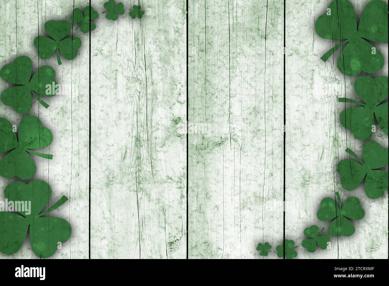St Patricks day background. Shamrocks over a light green wood ...