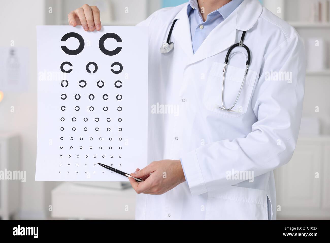 Ophthalmologist pointing at vision test chart in clinic, closeup Stock ...