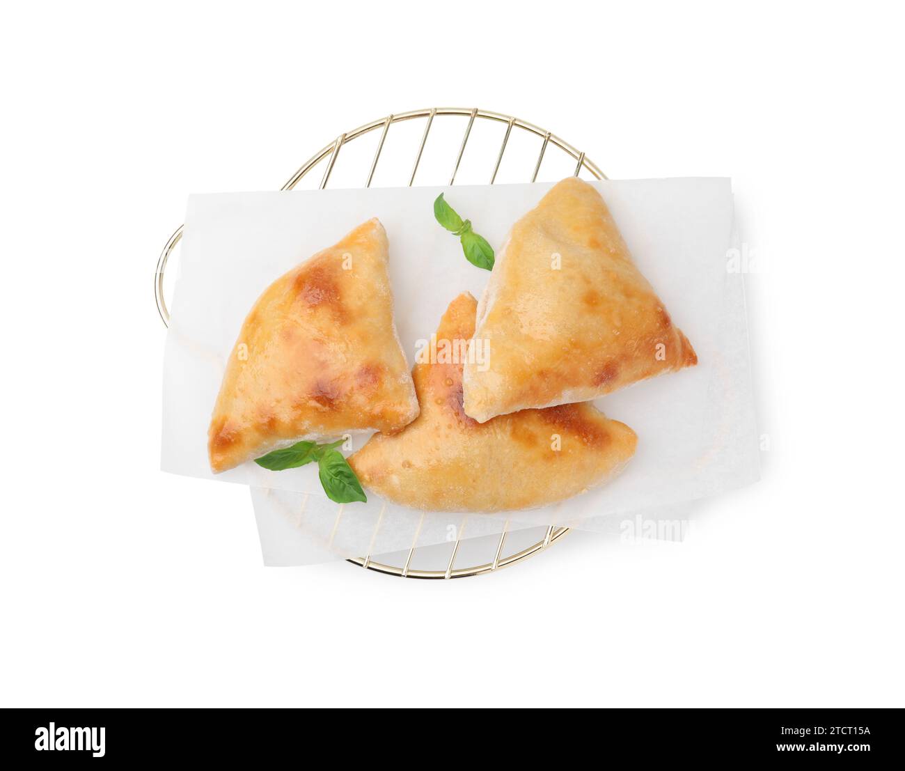 Delicious samosas and basil isolated on white, top view Stock Photo - Alamy