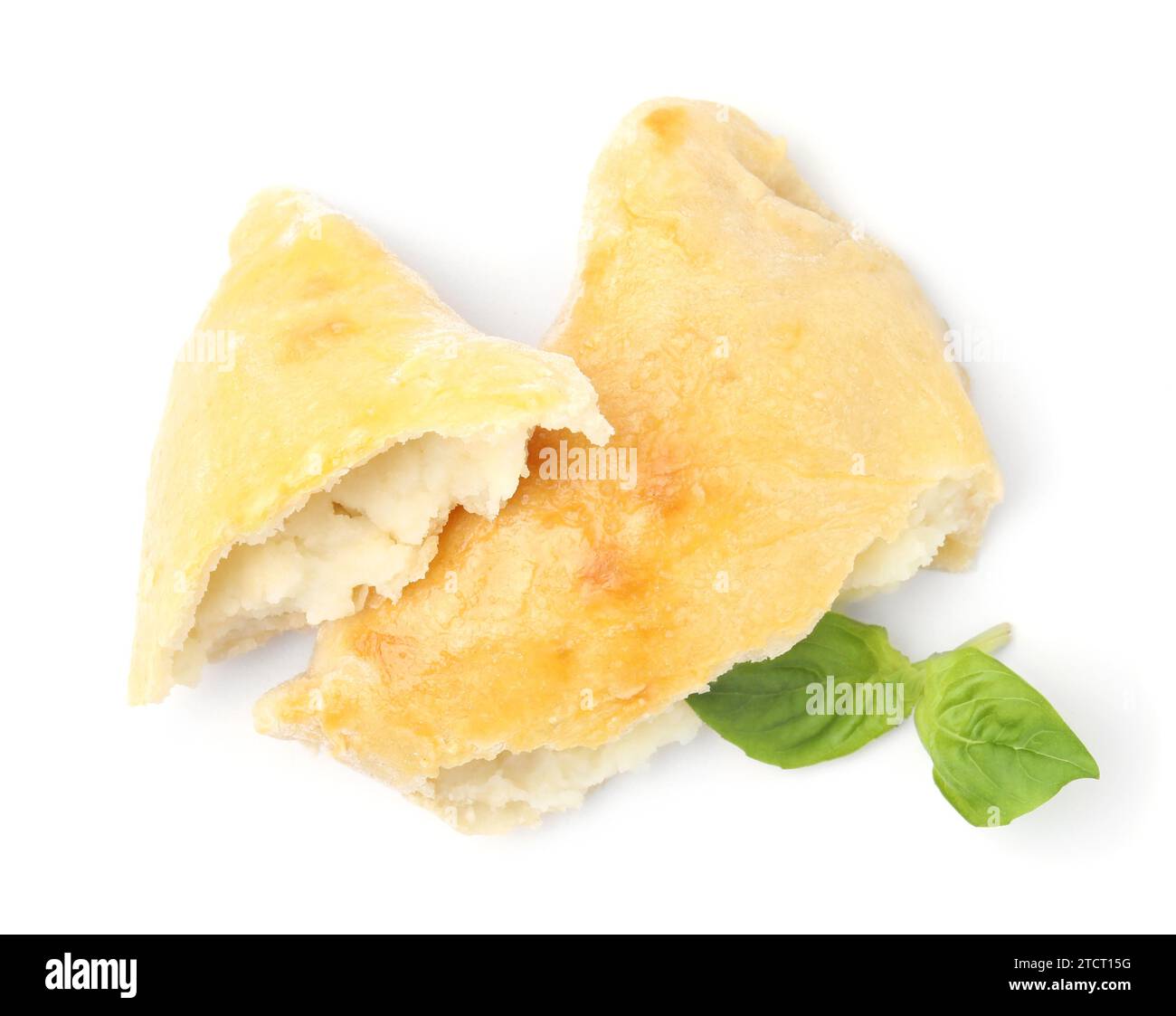 Delicious samosa and basil isolated on white, top view. Homemade pastry ...