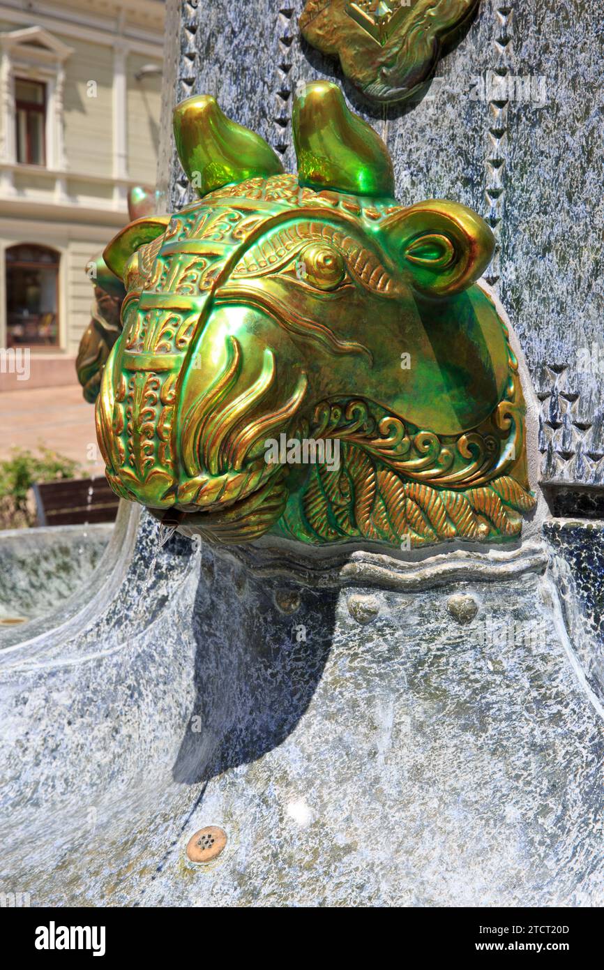 One of the four eosin water-spitting ox-head spigots of the Zsolnay ...