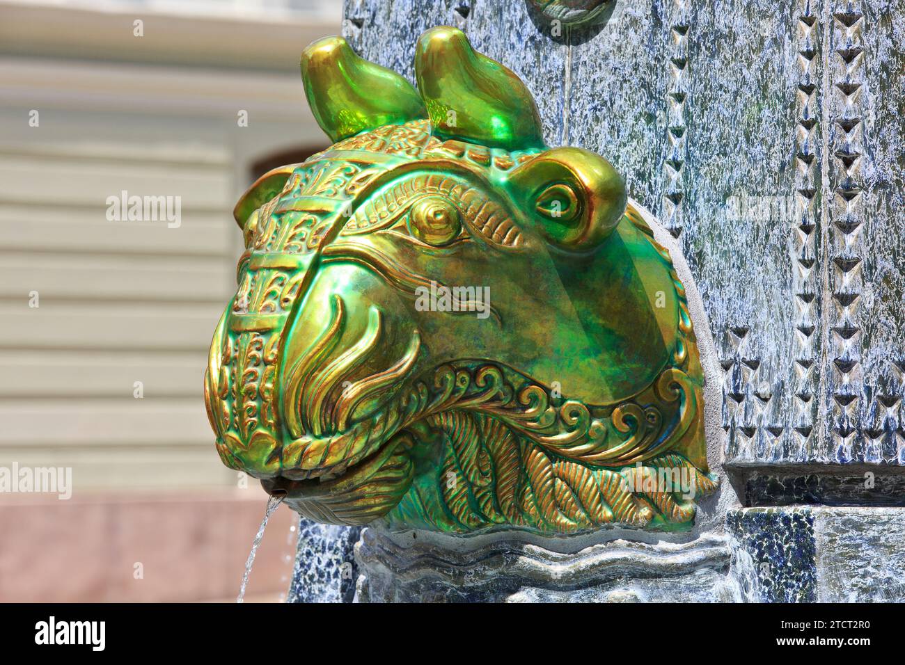 One of the four eosin water-spitting ox-head spigots of the Zsolnay ...