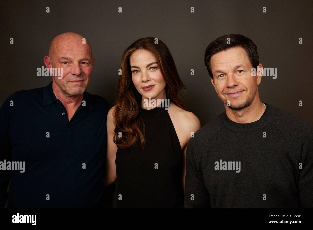 Director Simon Cellan Jones, left, poses with actors Michelle Monaghan ...