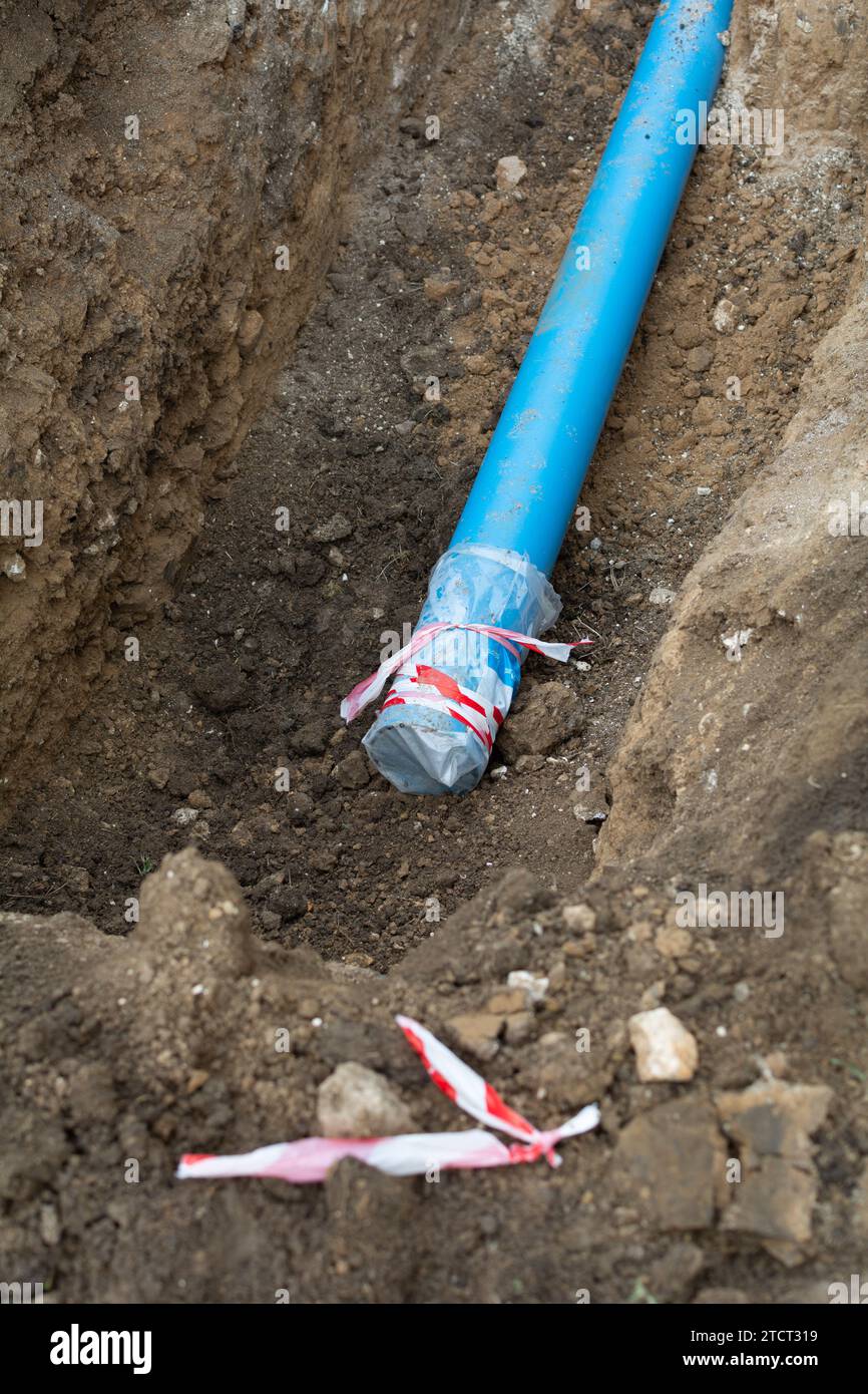 Plumbing pipe laying. Plastic polypropylene pipe. Sanitary, sewer ...